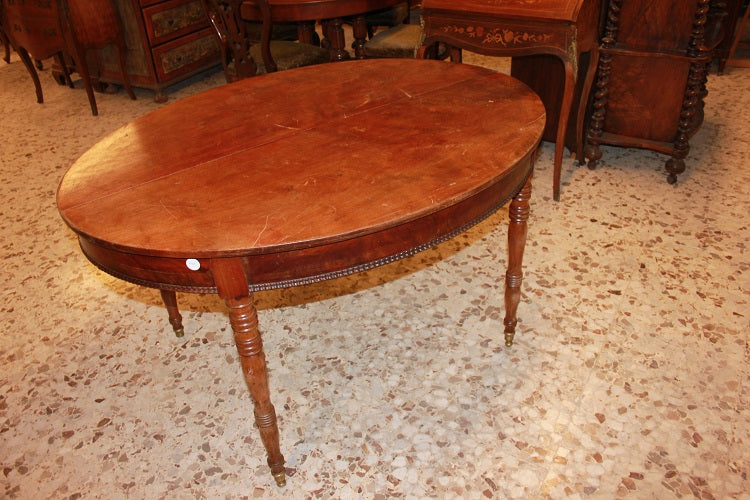 Tavolo ovale Luigi Filippo allungabile in legno di mogano